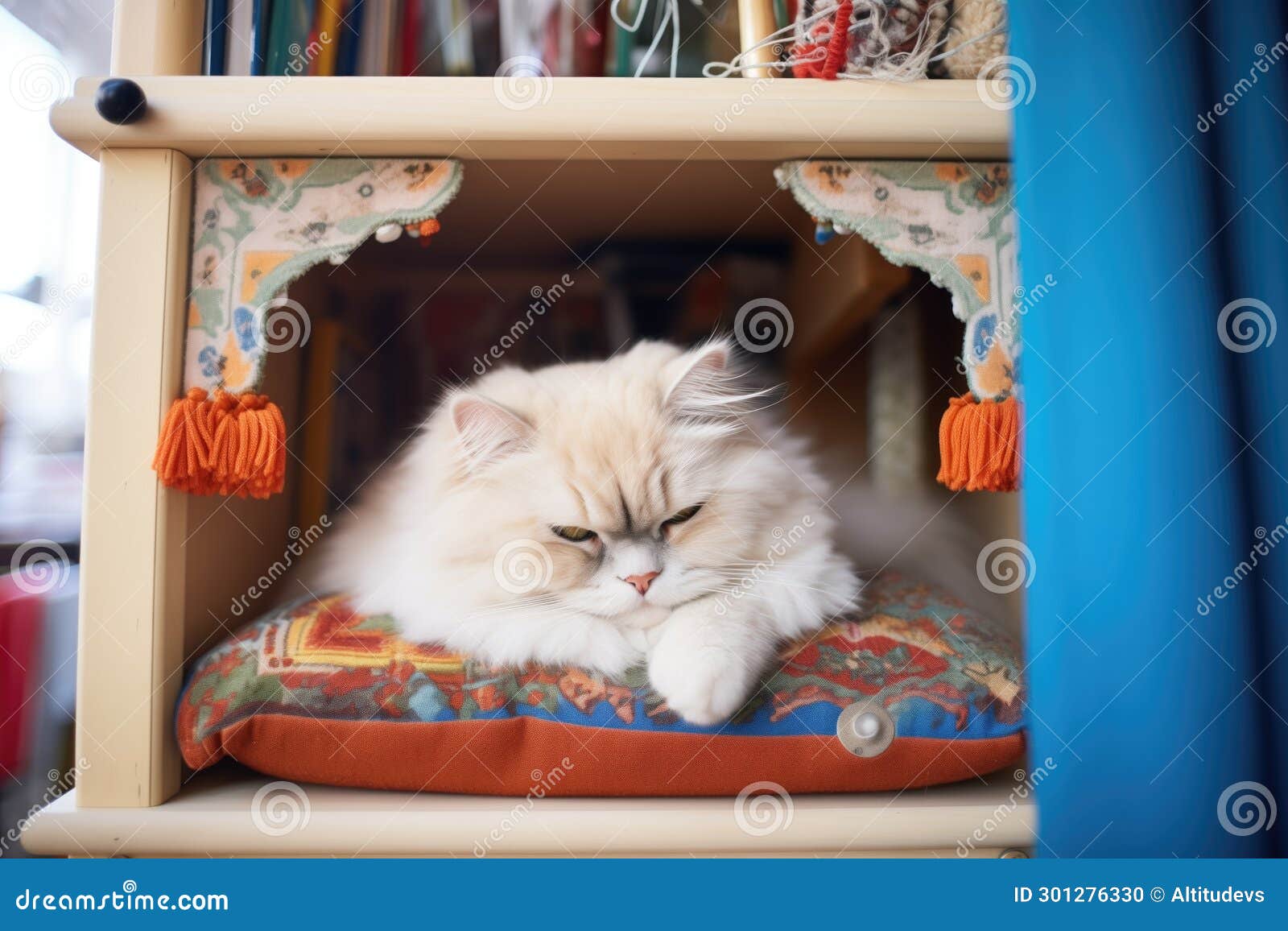 Persian Cat Sleeping within an Enclosed Cubby of a Cat Tree Stock Photo ...