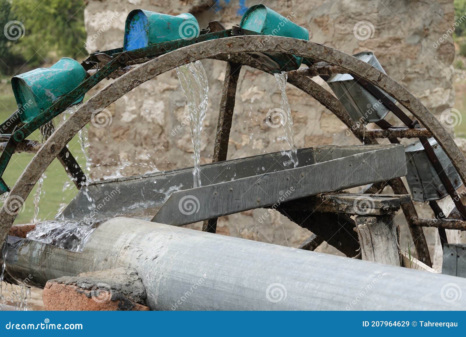 Persian wheel on a well stock image. Image of rural - 207964629