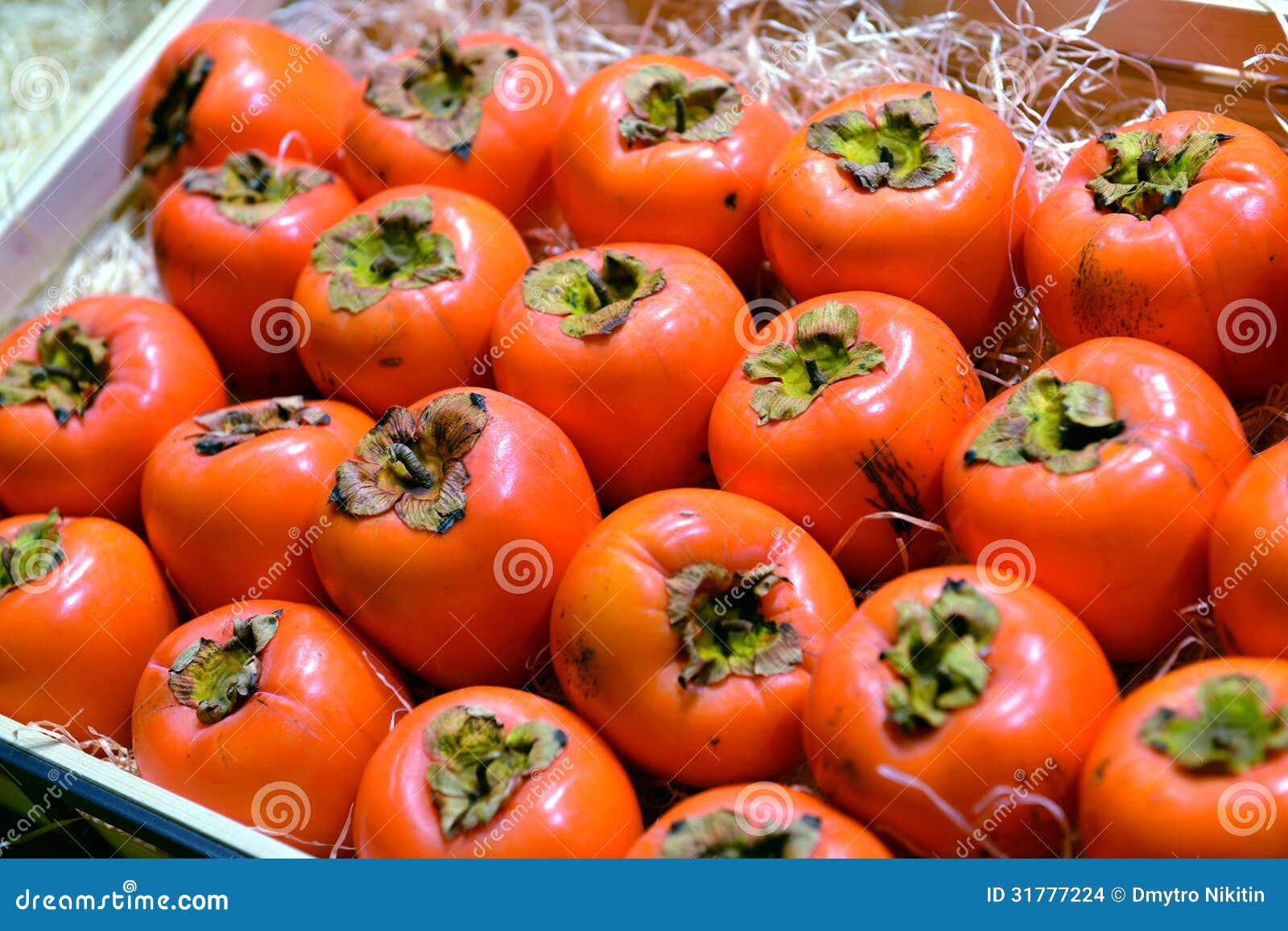 Persimmon in a box stock photo. Image of persimmon, exotic - 31777224