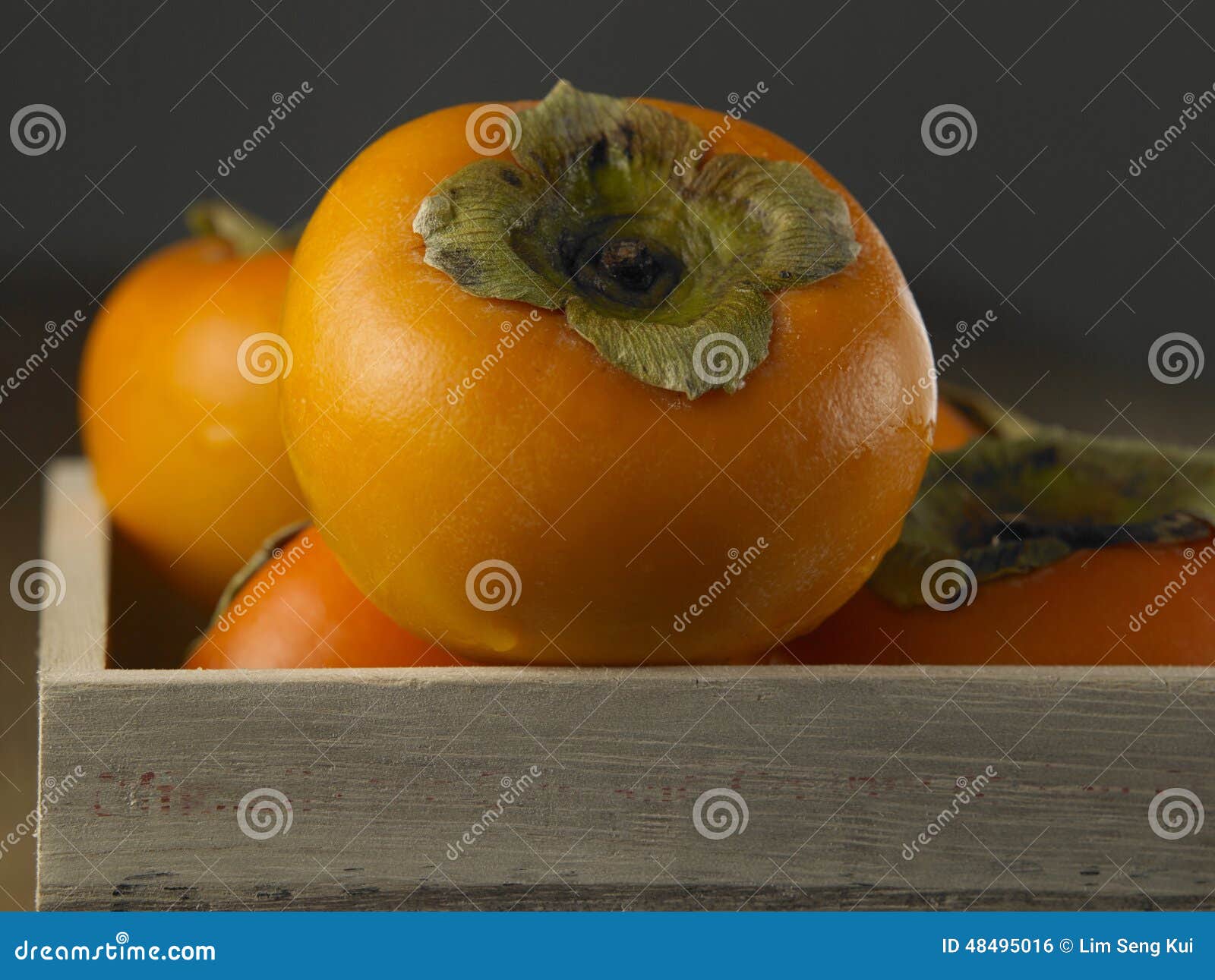 Persimmon stock photo. Image of persimmon, dessert, wooden - 48495016