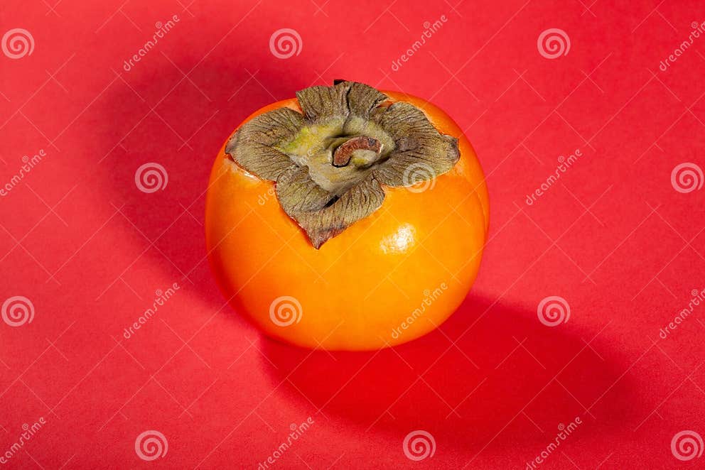 Persimmon on Red Background Stock Image - Image of persimmons, food ...