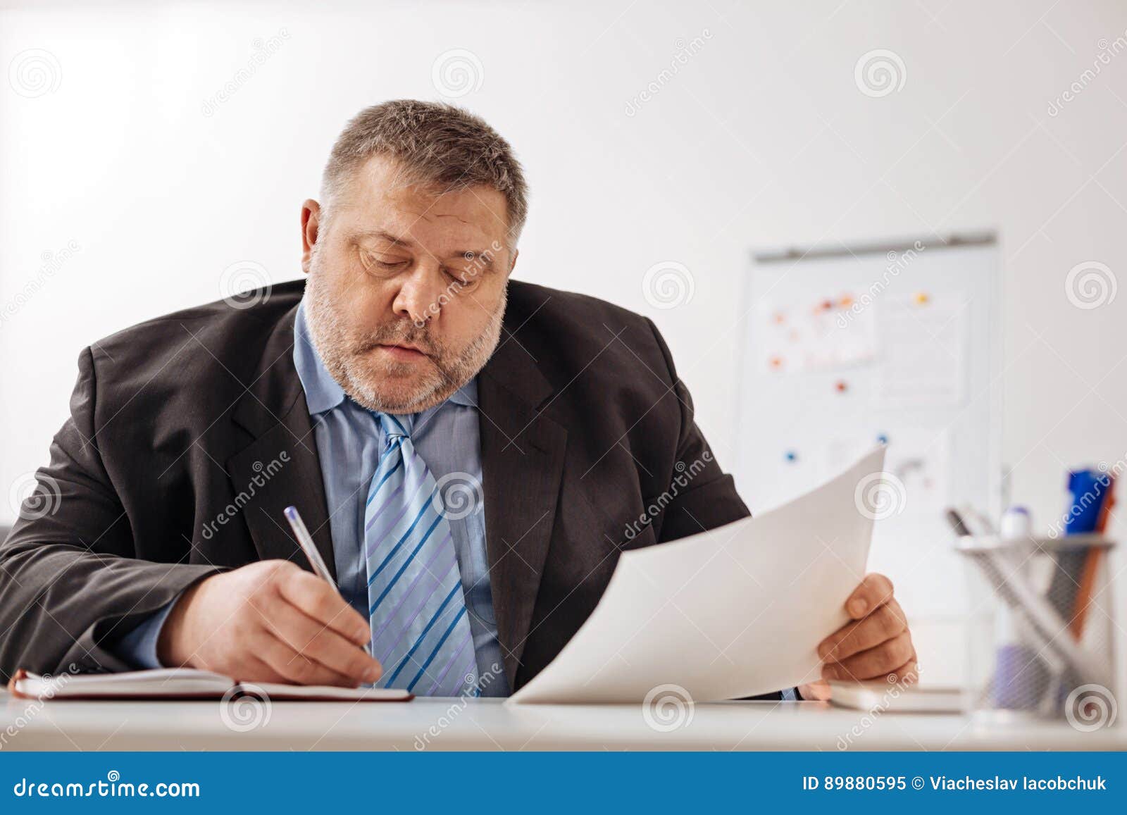 Persistent Office Worker Caught in the Process of Work Stock Image ...