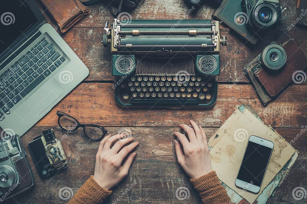 A Person is Actively Typing on a Typewriter while Also Using a Mouse ...