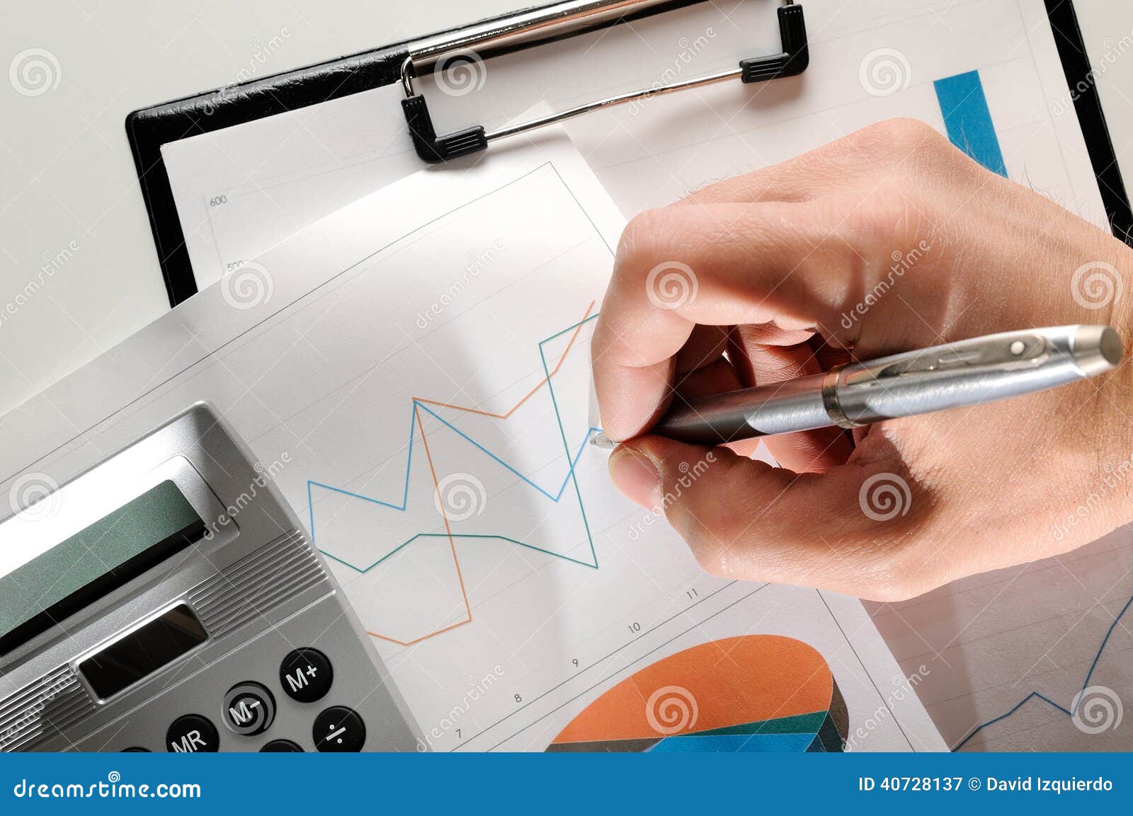 Person analyzing a graph stock image. Image of information - 40728137