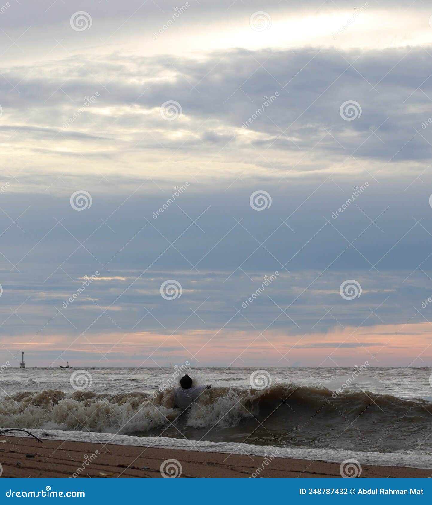 Person at the Beach Hit by the Wave during High Tide Stock Photo ...
