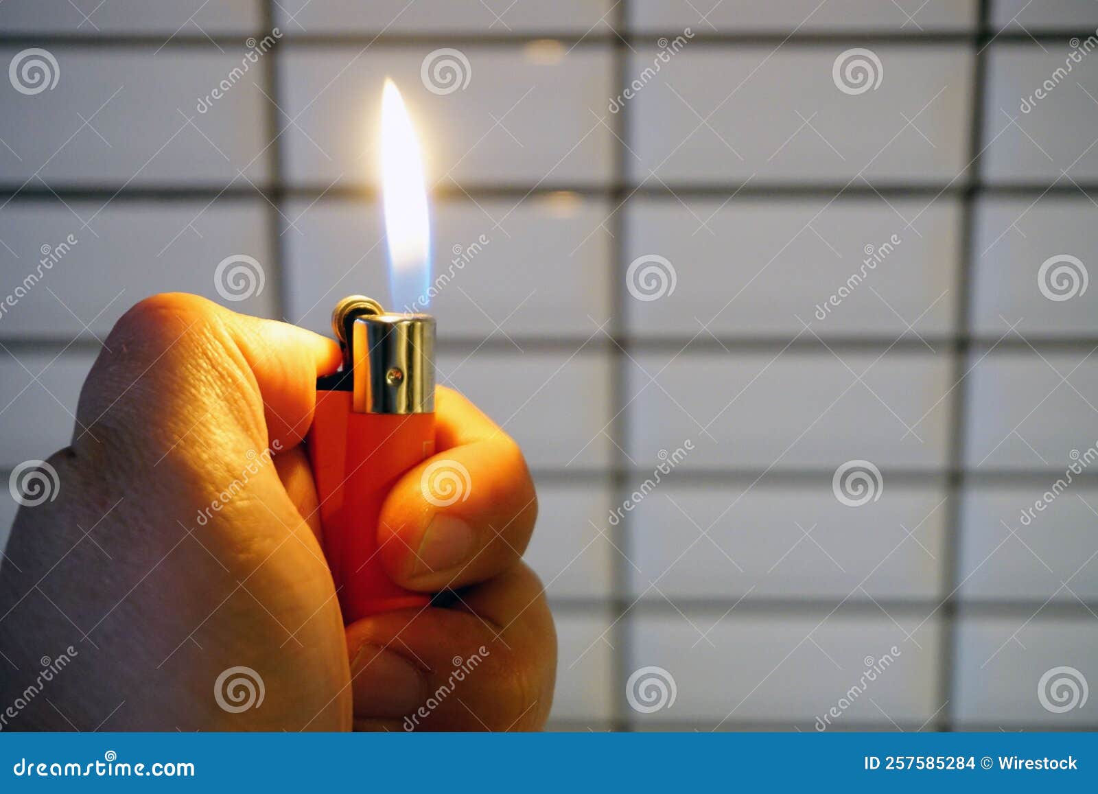 Person burning a lighter stock photo. Image of smoke - 257585284