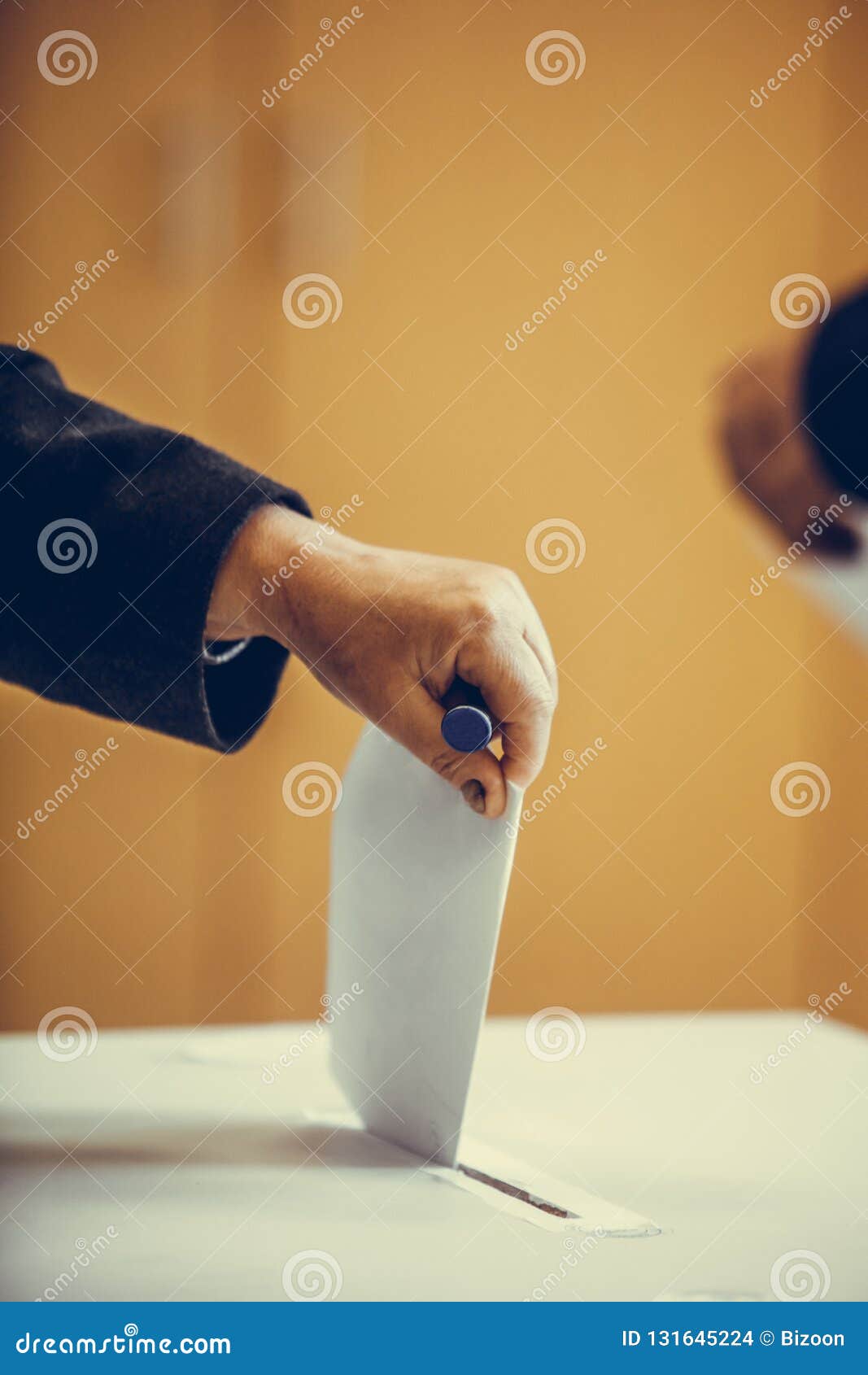 Person Casting a Ballot at a Polling Station, during Elections Stock ... Person Casting a Ballot at a Polling Station, during Elections Stock ...