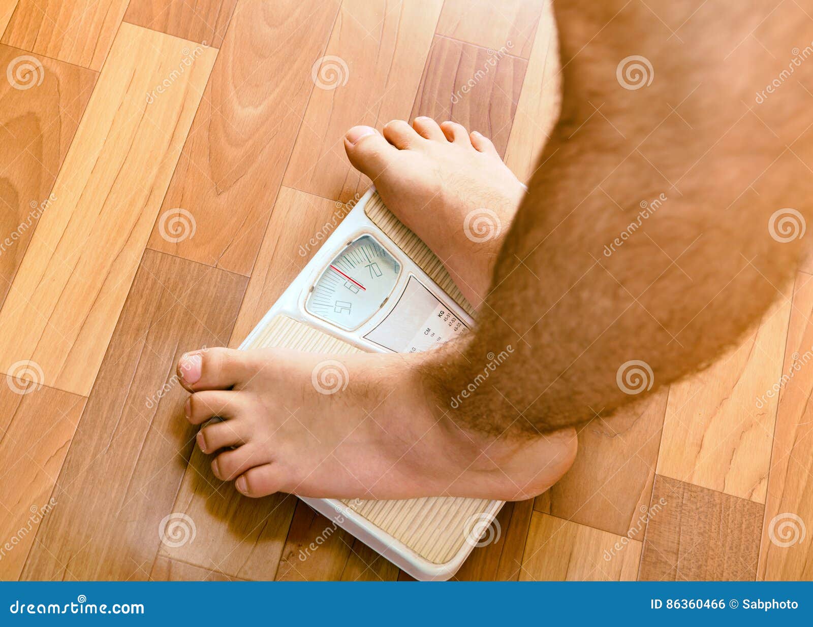 Person check a Weight stock photo. Image of pleasure - 86360466