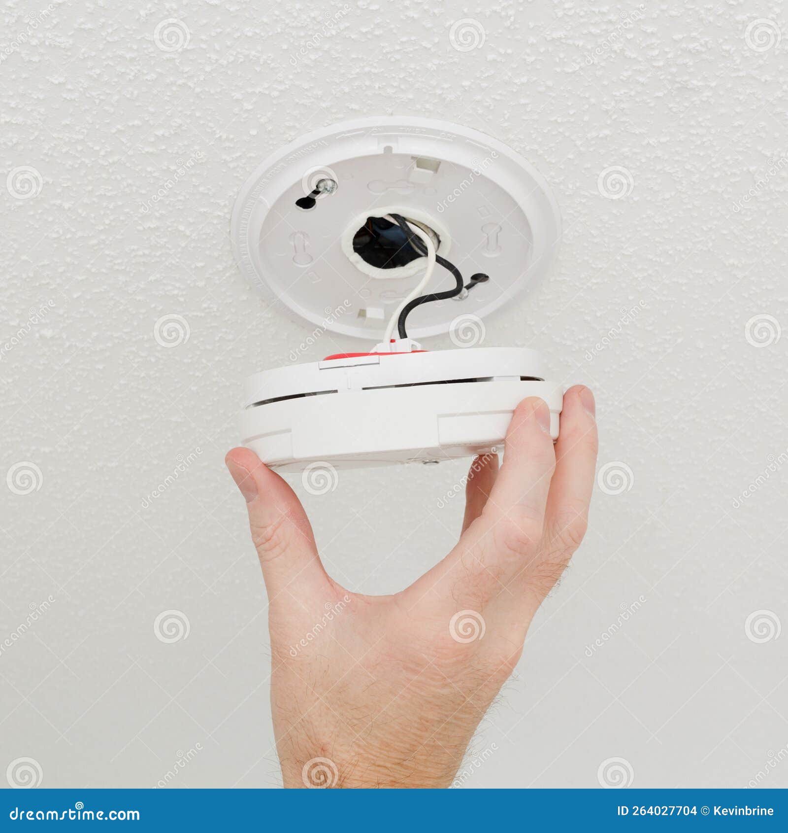 Checking Smoke Detector stock photo. Image of device - 264027704