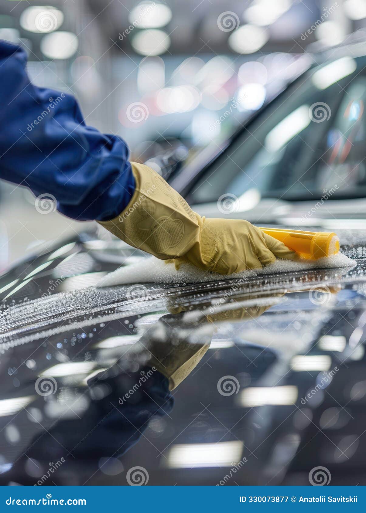 A Person is Cleaning and Polishing the Interior Surfaces of a Car Using ...
