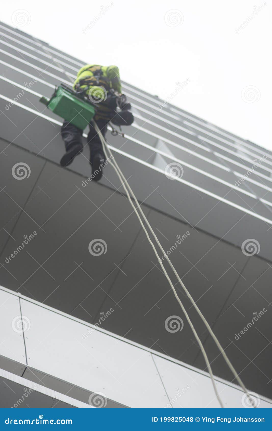 Person Cleaning Windows on Facade of High Building Stock Photo - Image ...