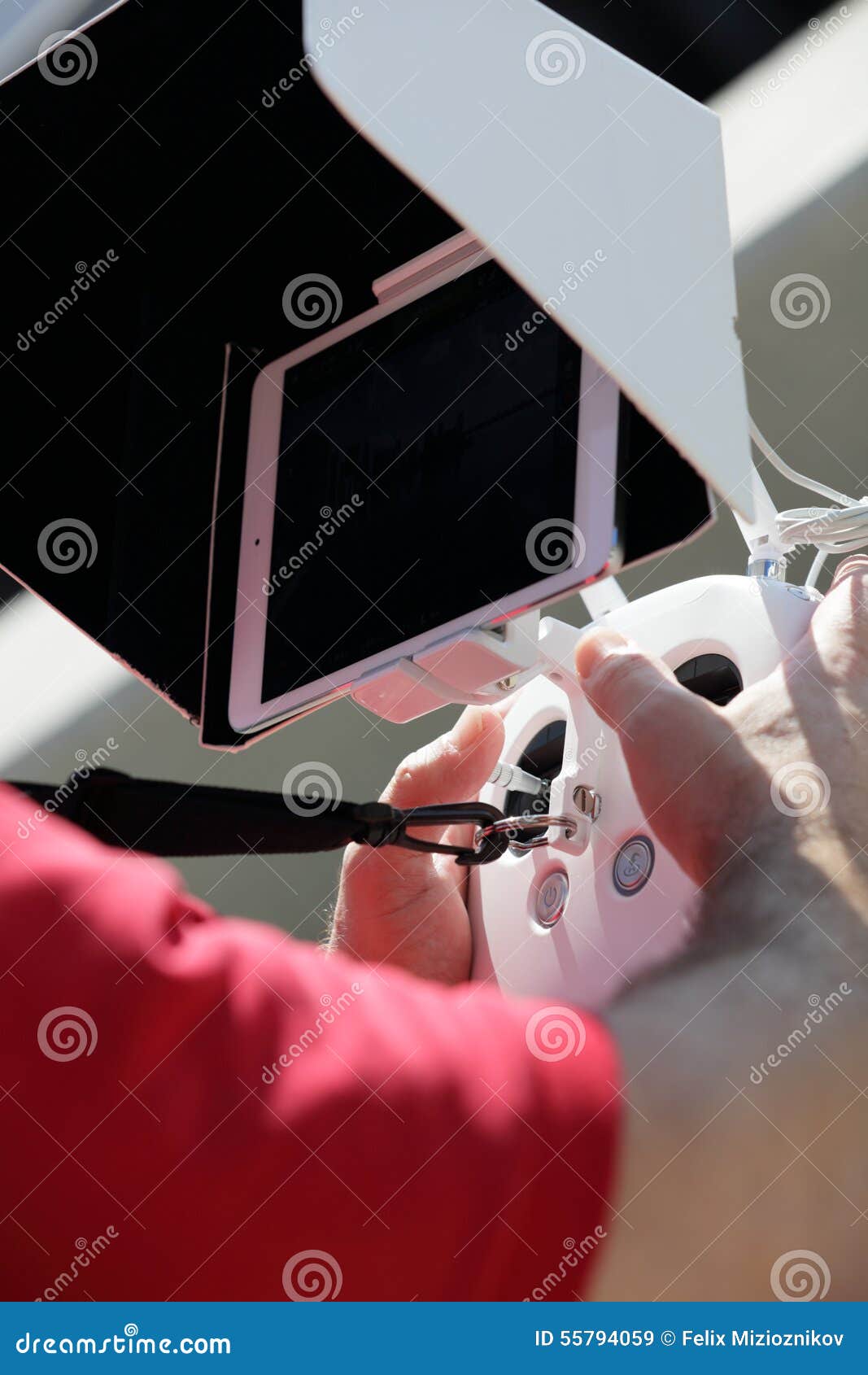 Person controlling a drone stock image. Image of phantom - 55794059