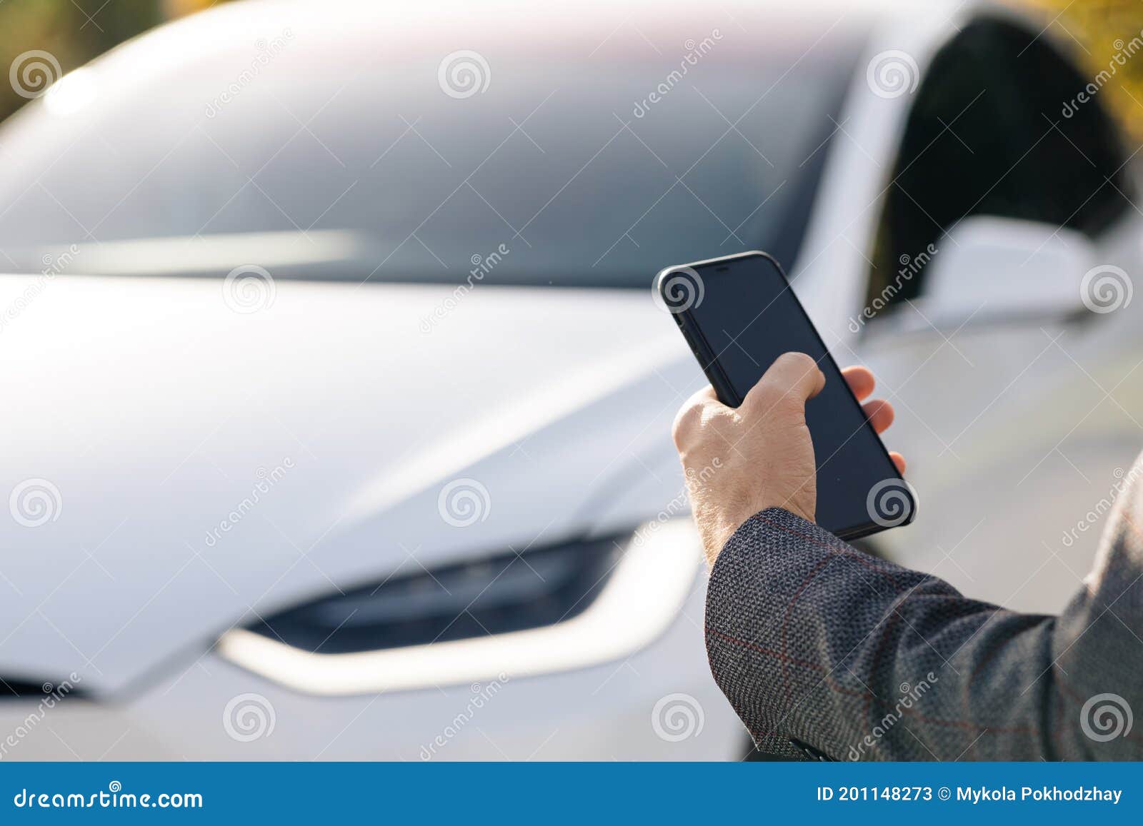 Person Controls a Self-driving Electric Car Using Mobile Application ...