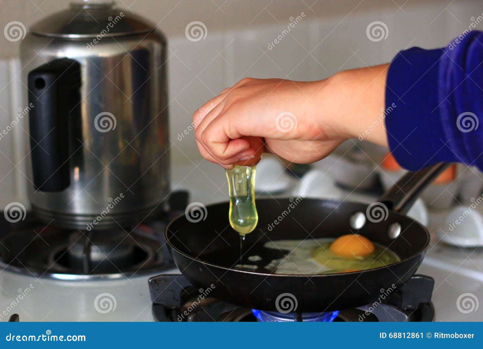 Man Cracking Open A Boiled Egg For Breakfast Royalty-Free Stock ...