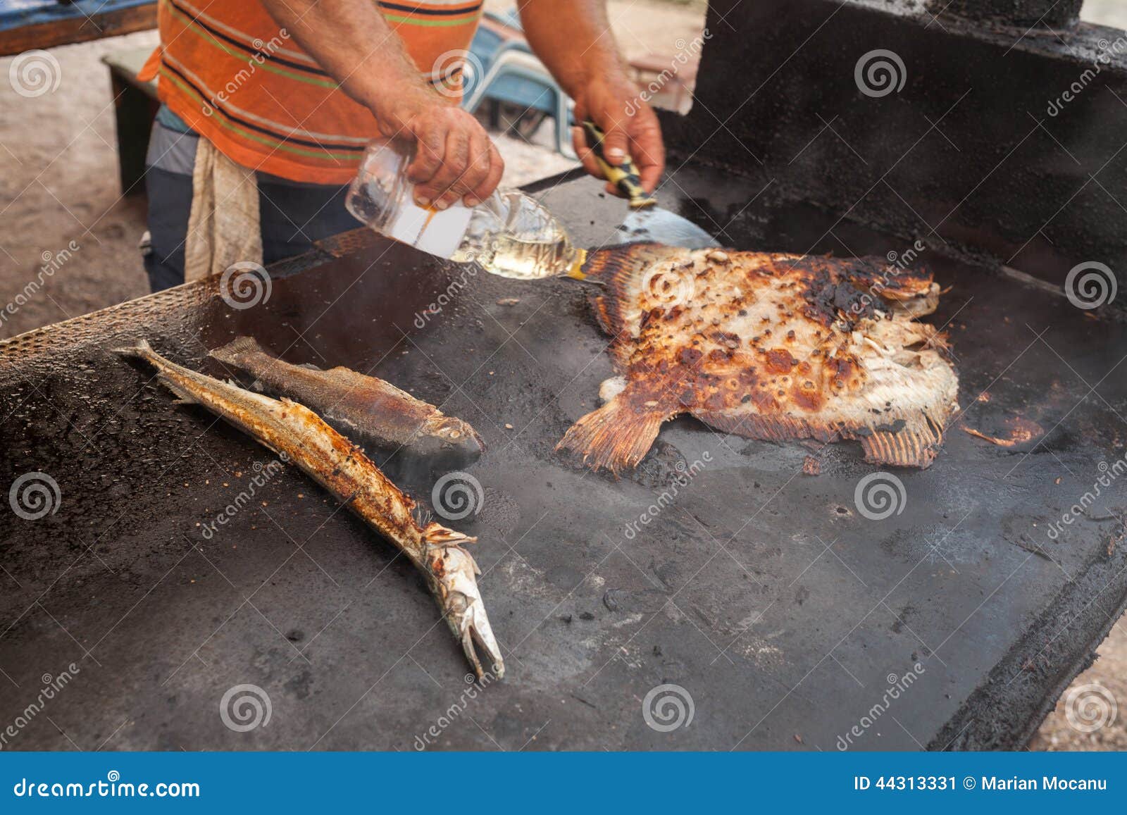 Person Cooking Mussels and Fish on a Grill Stock Image - Image of lunch ...