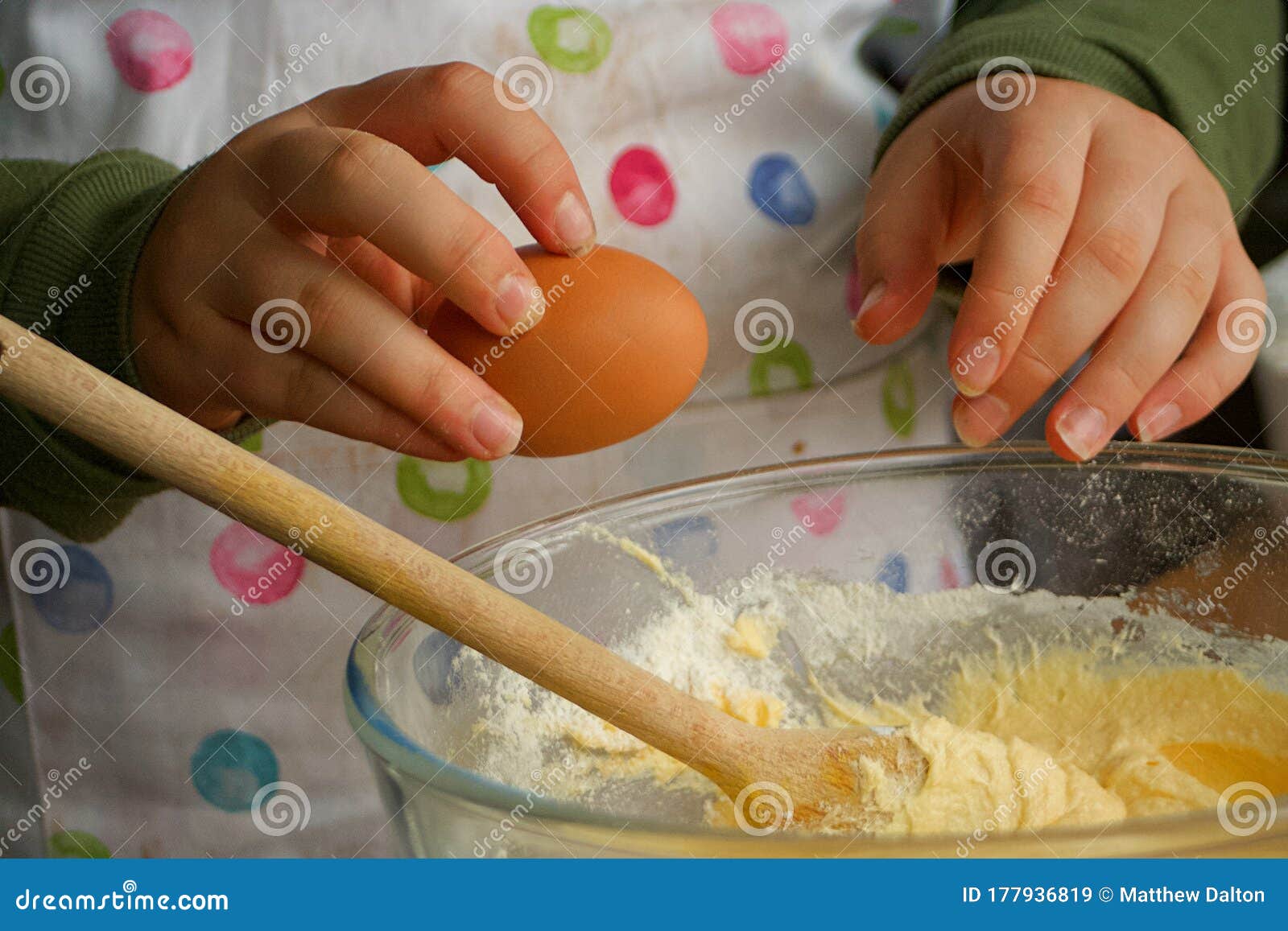 A Person Cracking an Egg into a Bowl. Stock Image - Image of person ...