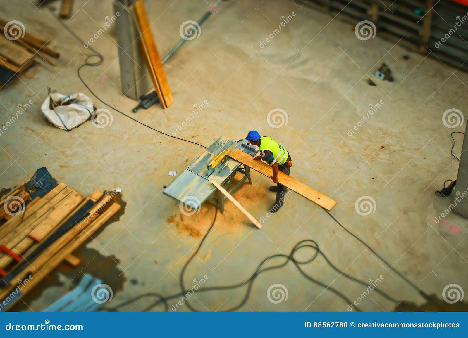 Person Cutting Wood On Table Saw During Daytime Picture. Image: 88562780