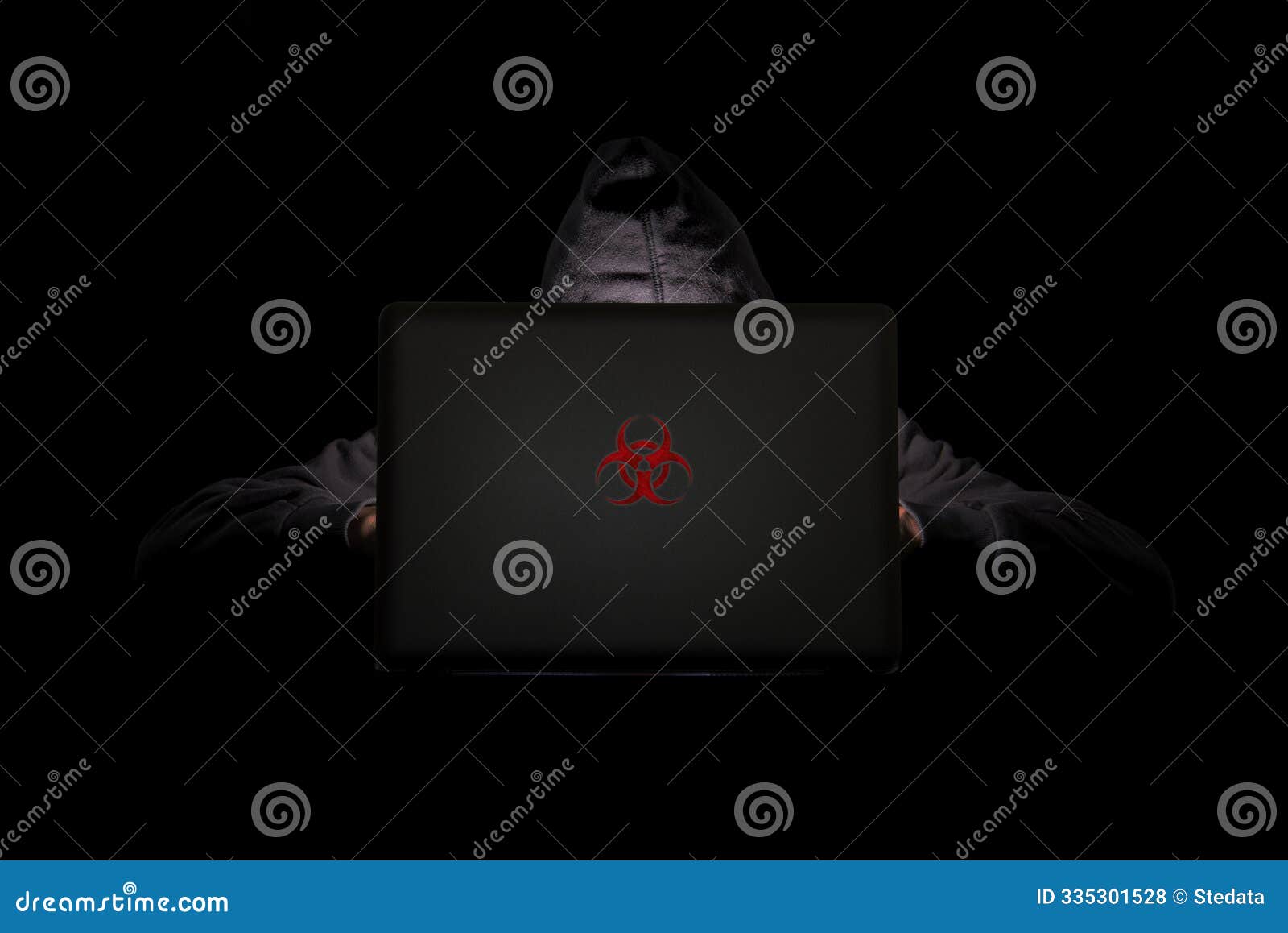 A Person in a Dark Room Using a Laptop with a Biohazard Logo, Internet ...
