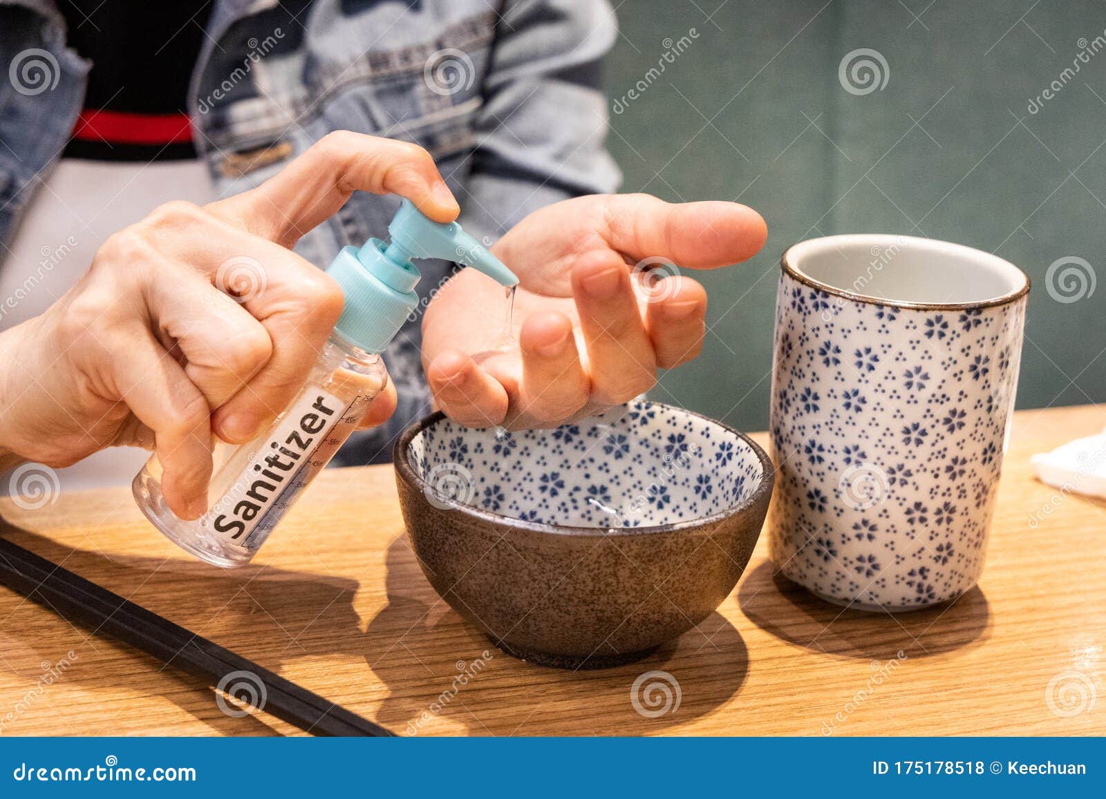 Person Disinfecting A Table With Disinfectant. Cleaning A Surface With ...