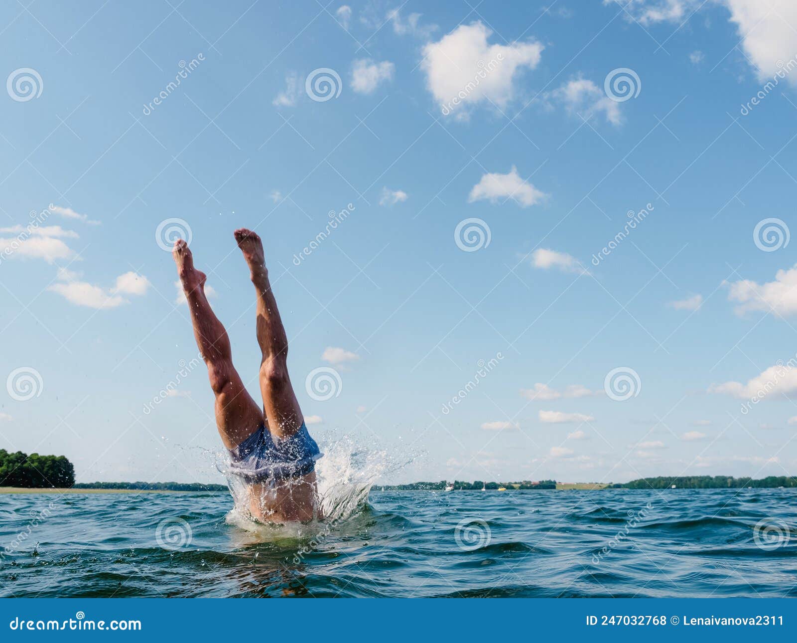 Diving. Legs In Black Rubber Wetsuit And Flippers Stock Photography ...