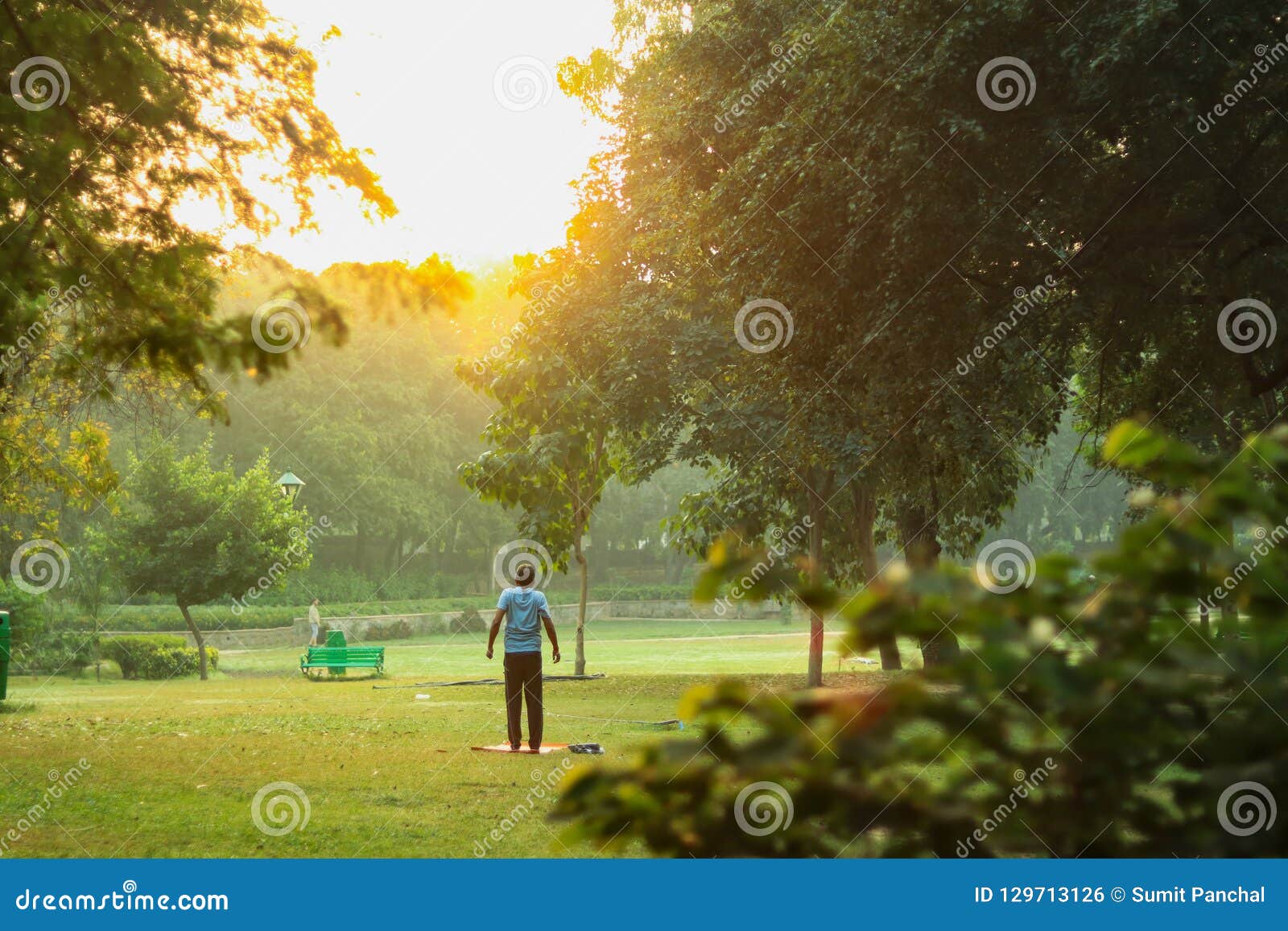 A Person Doing Exercise in Front of Sunrise Stock Photo - Image of ...