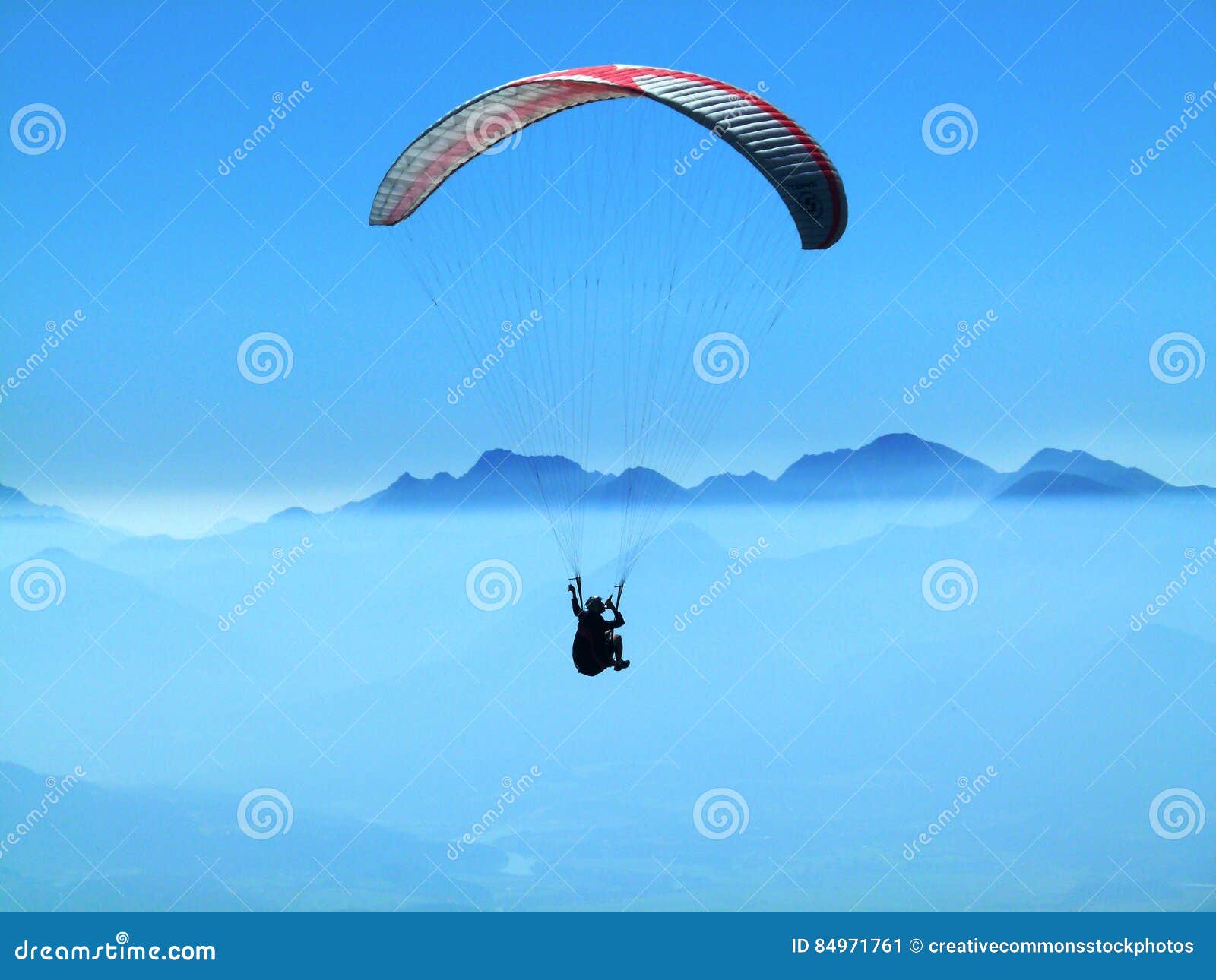 Person Doing Paragliding Above Clouds During Daytime Picture. Image ...