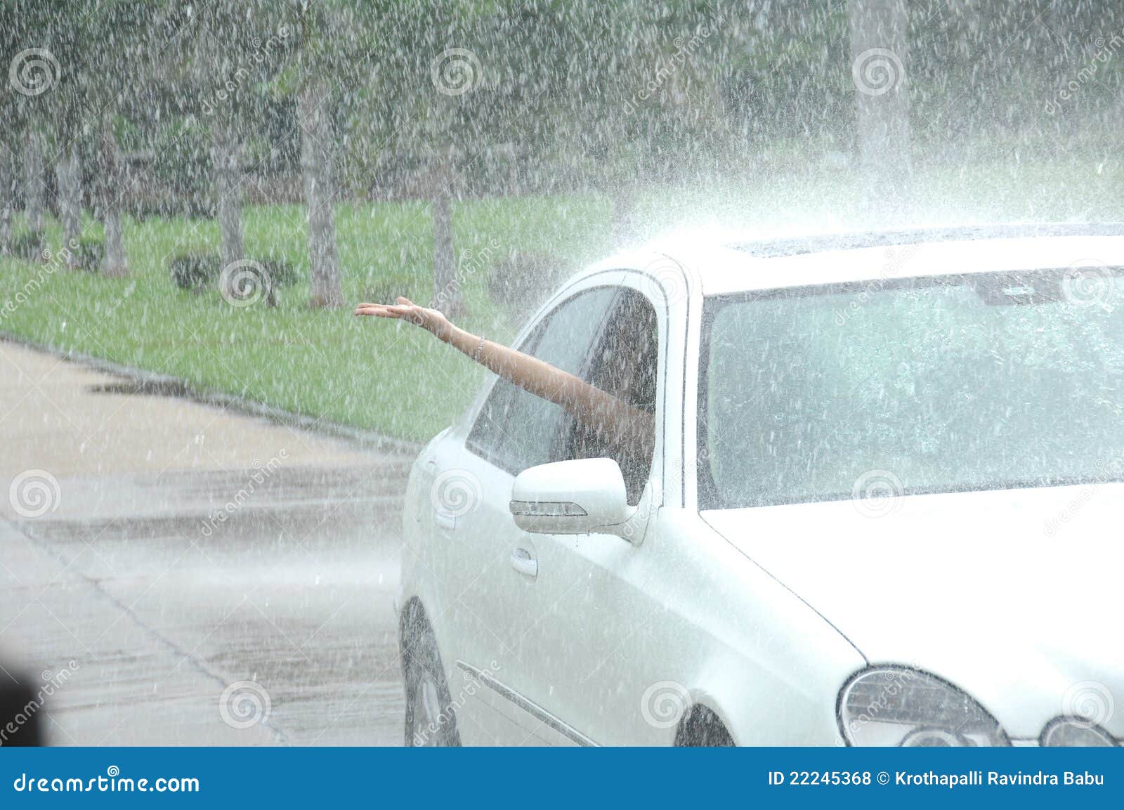 Person driving car in rain stock photo. Image of raining - 22245368