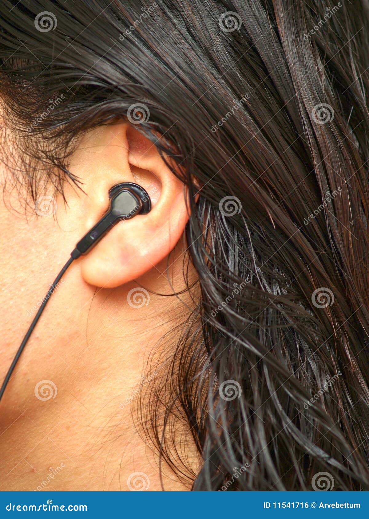 Person with ear plug stock photo. Image of headphones - 11541716