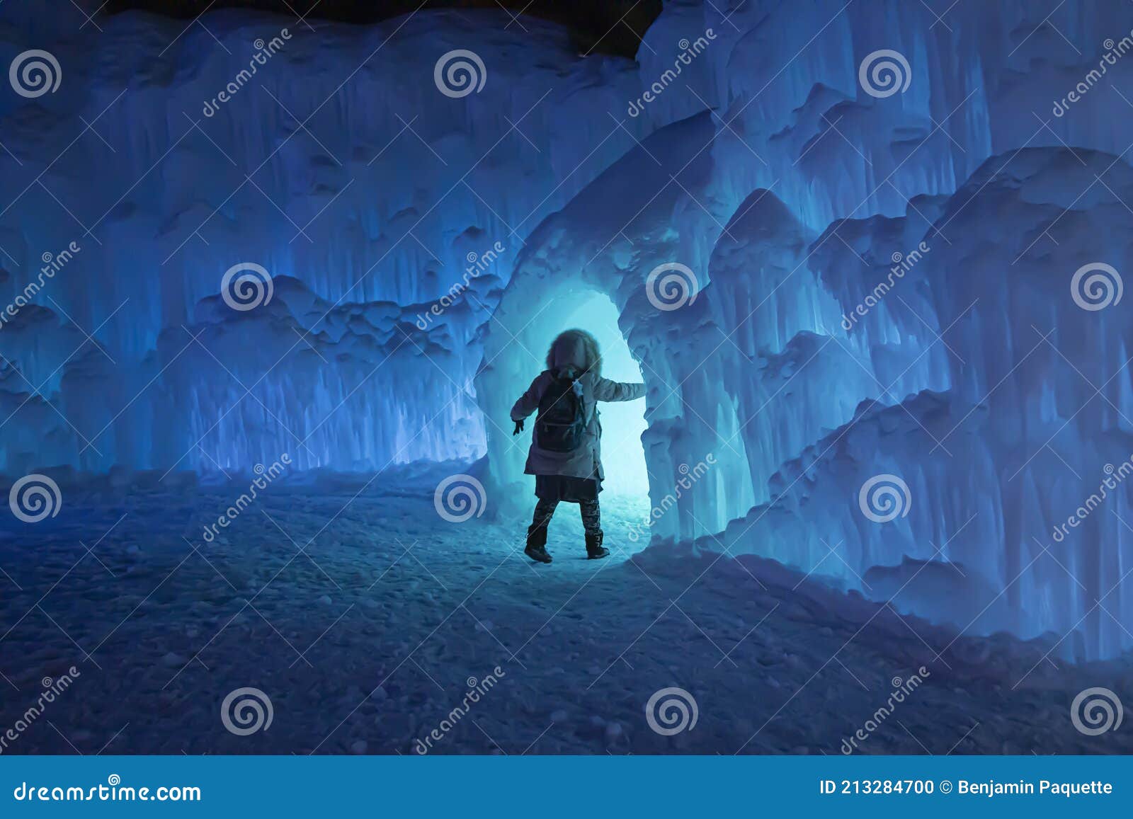 Person Exploring an Ice Cave in Winter Stock Photo - Image of alone ...