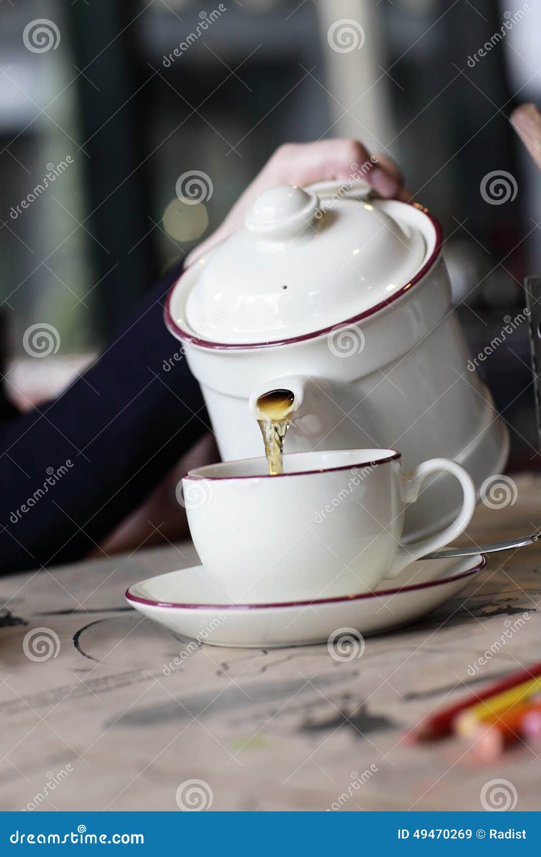 Person filling cup of tea stock image. Image of hand - 49470269