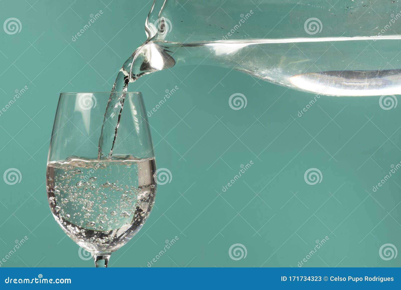 Person Filling a Cup of Water with a Jar Stock Image - Image of clean ...