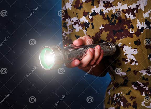 Person with Flashlight stock image. Image of shirt, lamp - 89749981