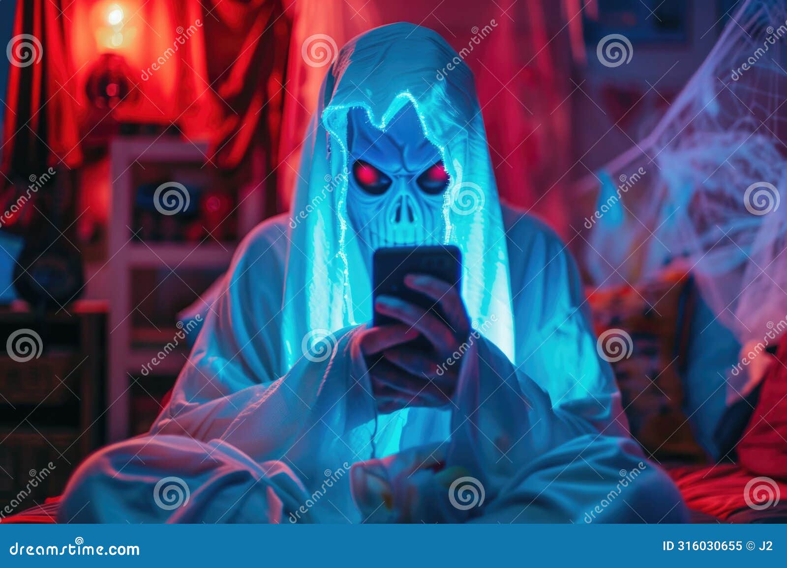 Person in Ghost Costume Using Smartphone with Vibrant Pink Background ...