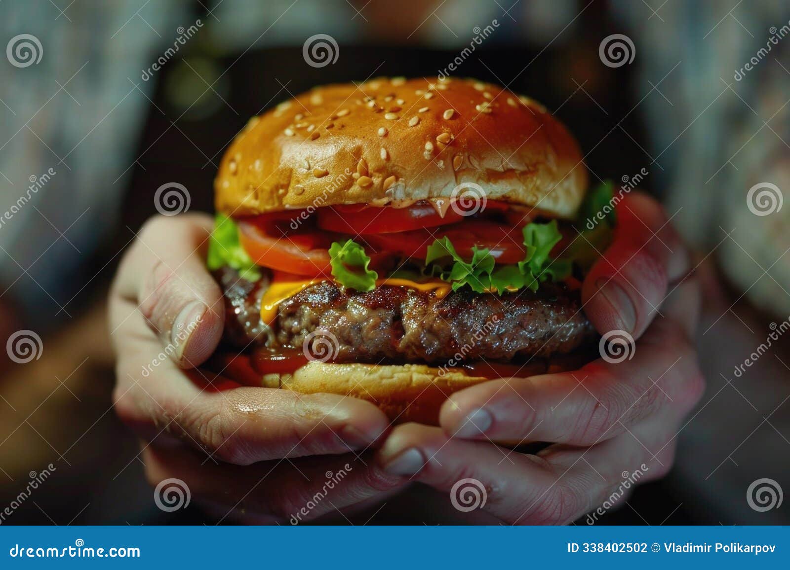 A Person Grasping a Hamburger with Their Hands Stock Photo - Image of ...
