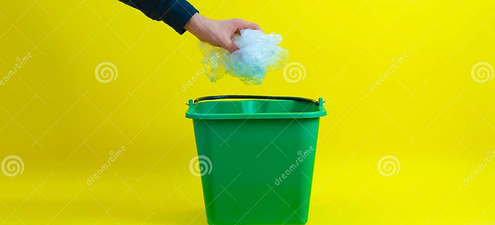 A Person Hand Drop Trash in the Garbage Bin Stock Photo - Image of ...