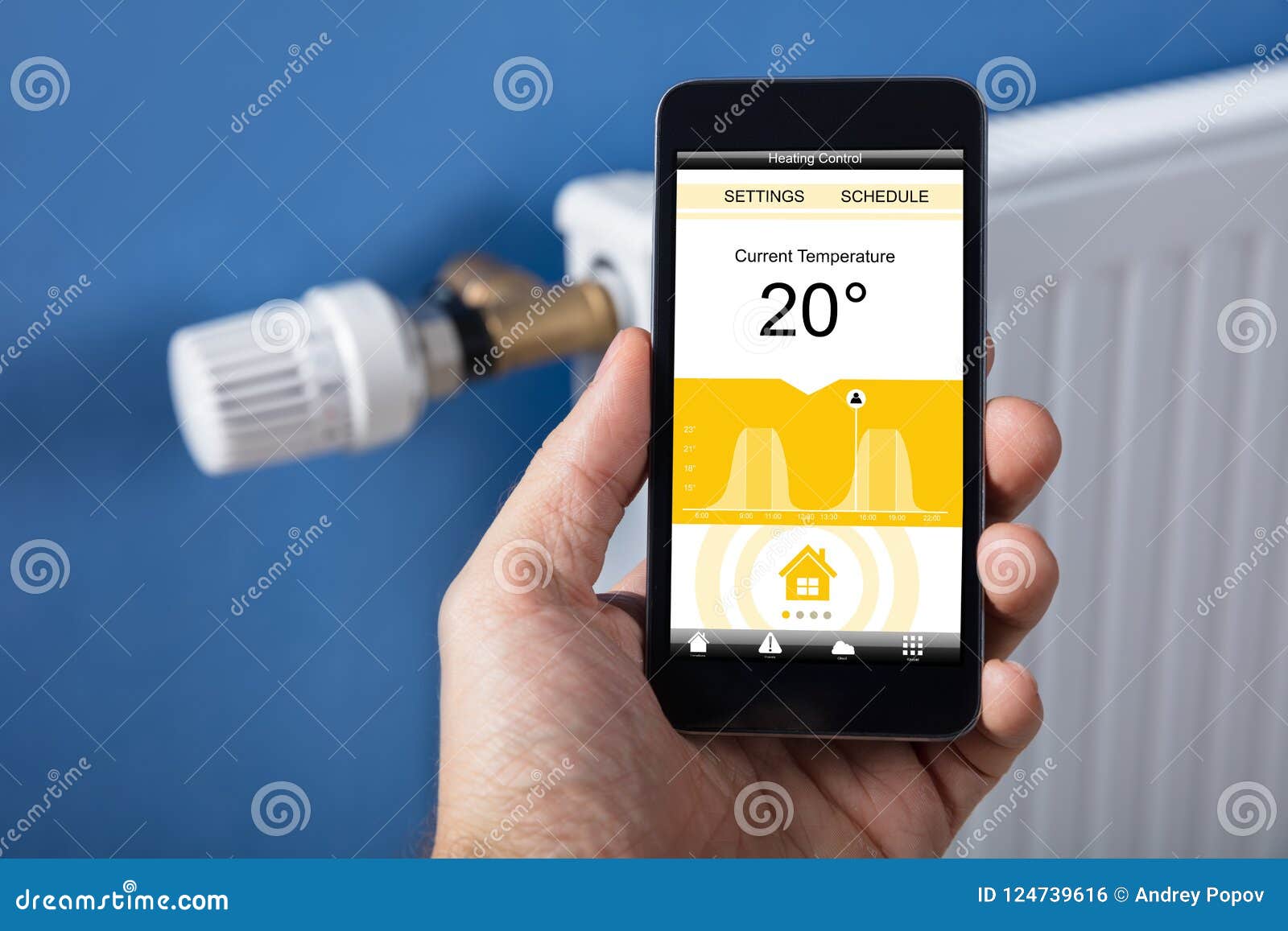Person Hand Setting Temperature of Thermostat Using Mobilephone Stock ...