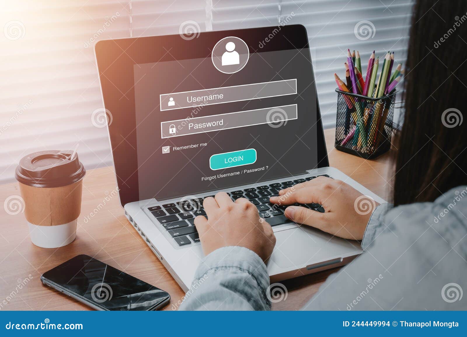 Person Hand Typing on Keyboard with Login and Password on Screen ...