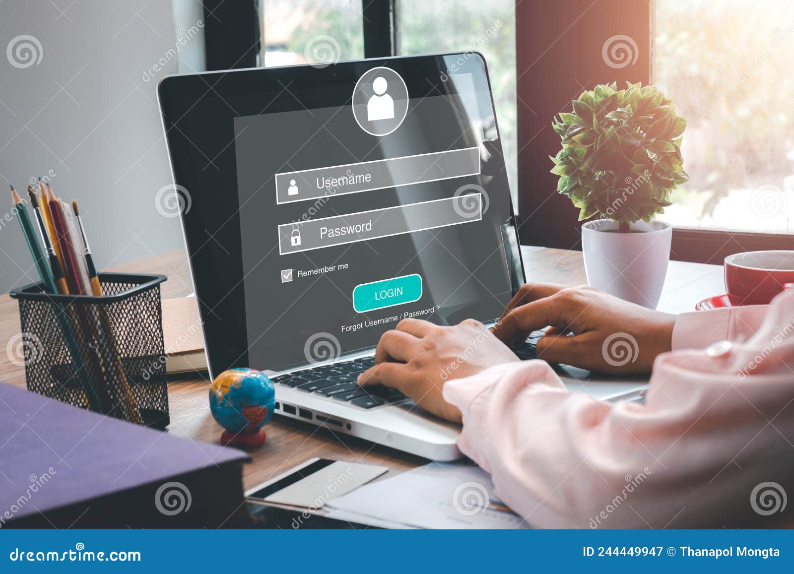 Person Hand Typing on Keyboard with Login and Password on Screen ...