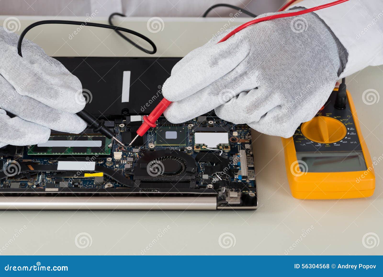 Person Hands with Laptop Motherboard and Multimeter Stock Photo - Image ...