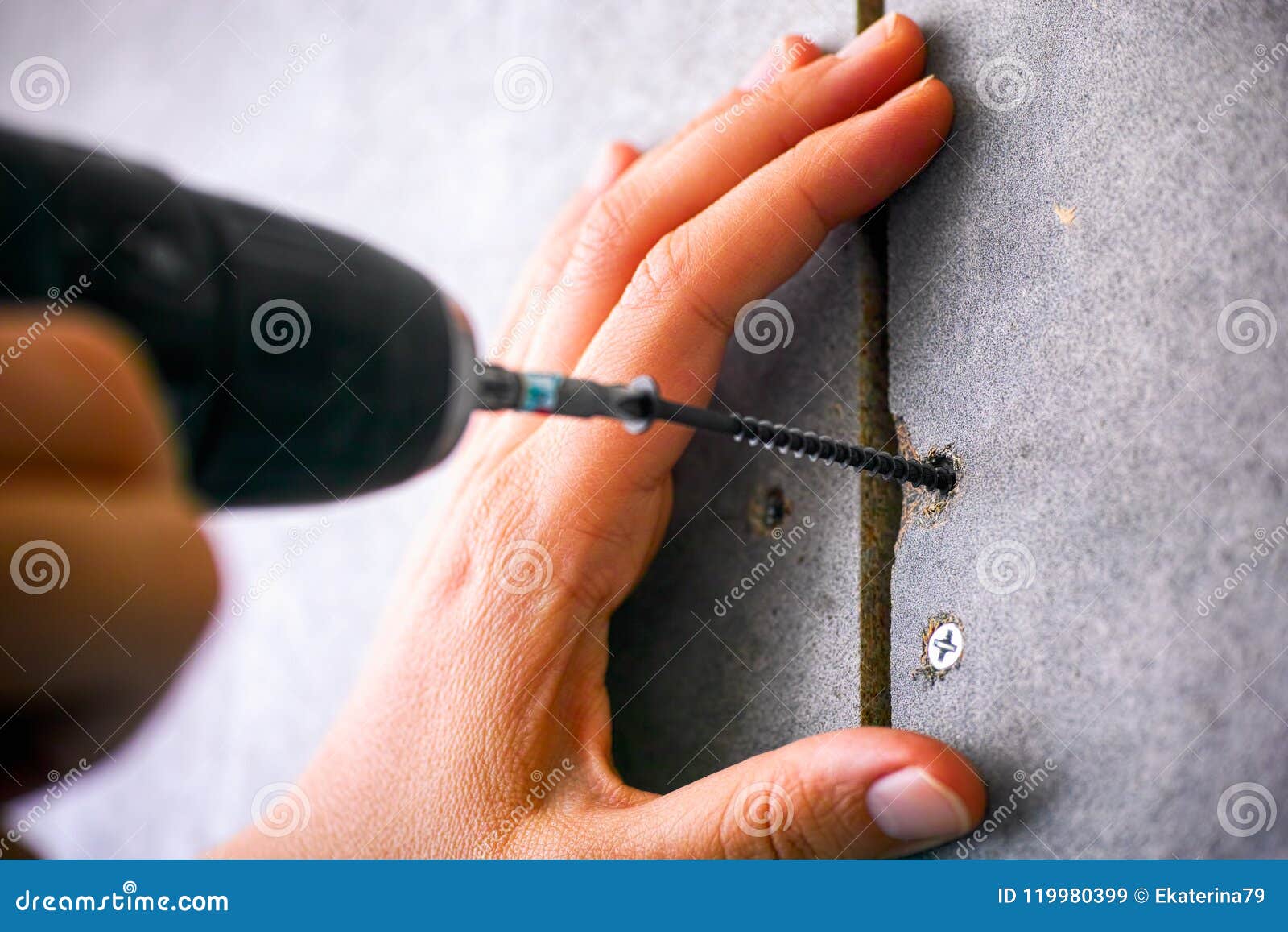 Person hands using drill. stock image. Image of wall - 119980399