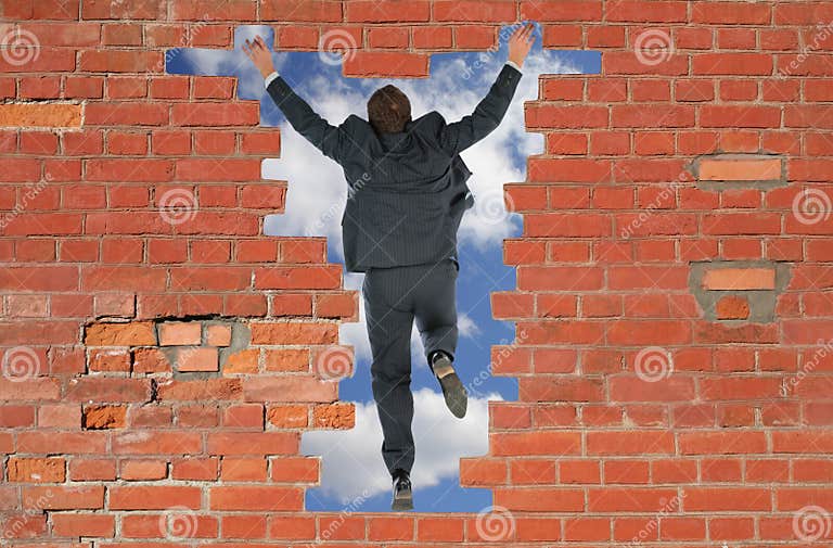 Person Has Jumped through a Brick Wall Stock Image - Image of male ...