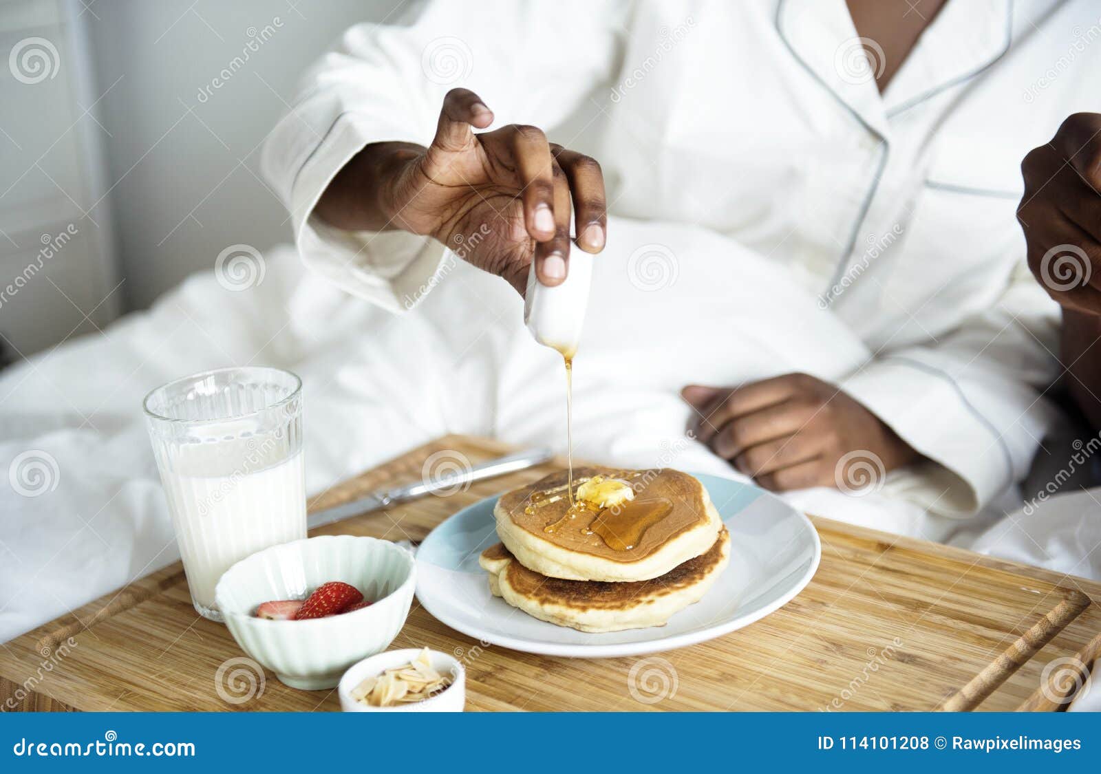A Person Having Breakfast in Bed Stock Photo - Image of drinking ...