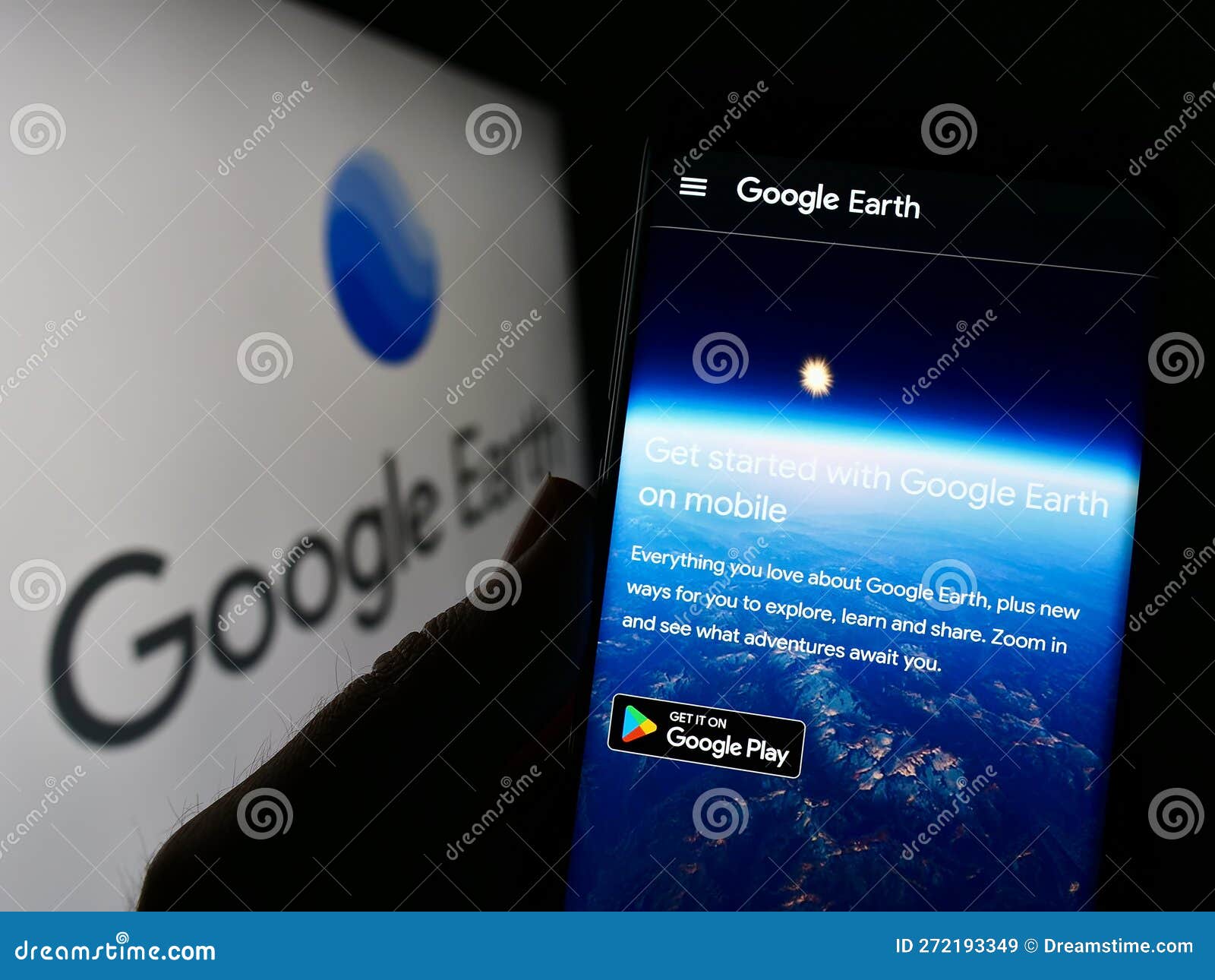 Person Holding Cellphone with Webpage of Satellite Imagery Software ...