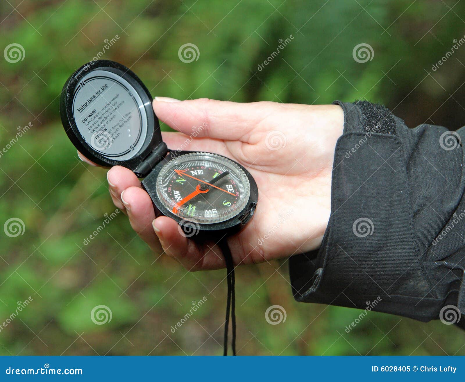 Person holding a Compass stock image. Image of hiker, arrow - 6028405