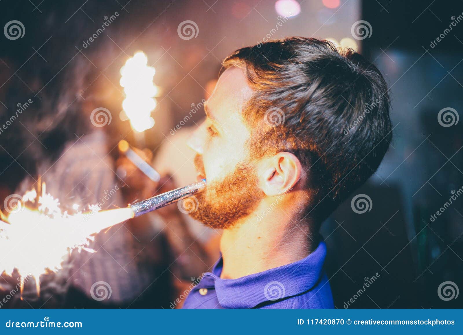 Person Holding Fireworks By Mouth Picture. Image: 117420870