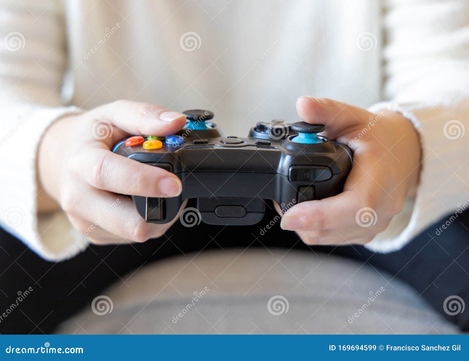 A Person Holding Game Controller Playing Video Games Stock Image ...