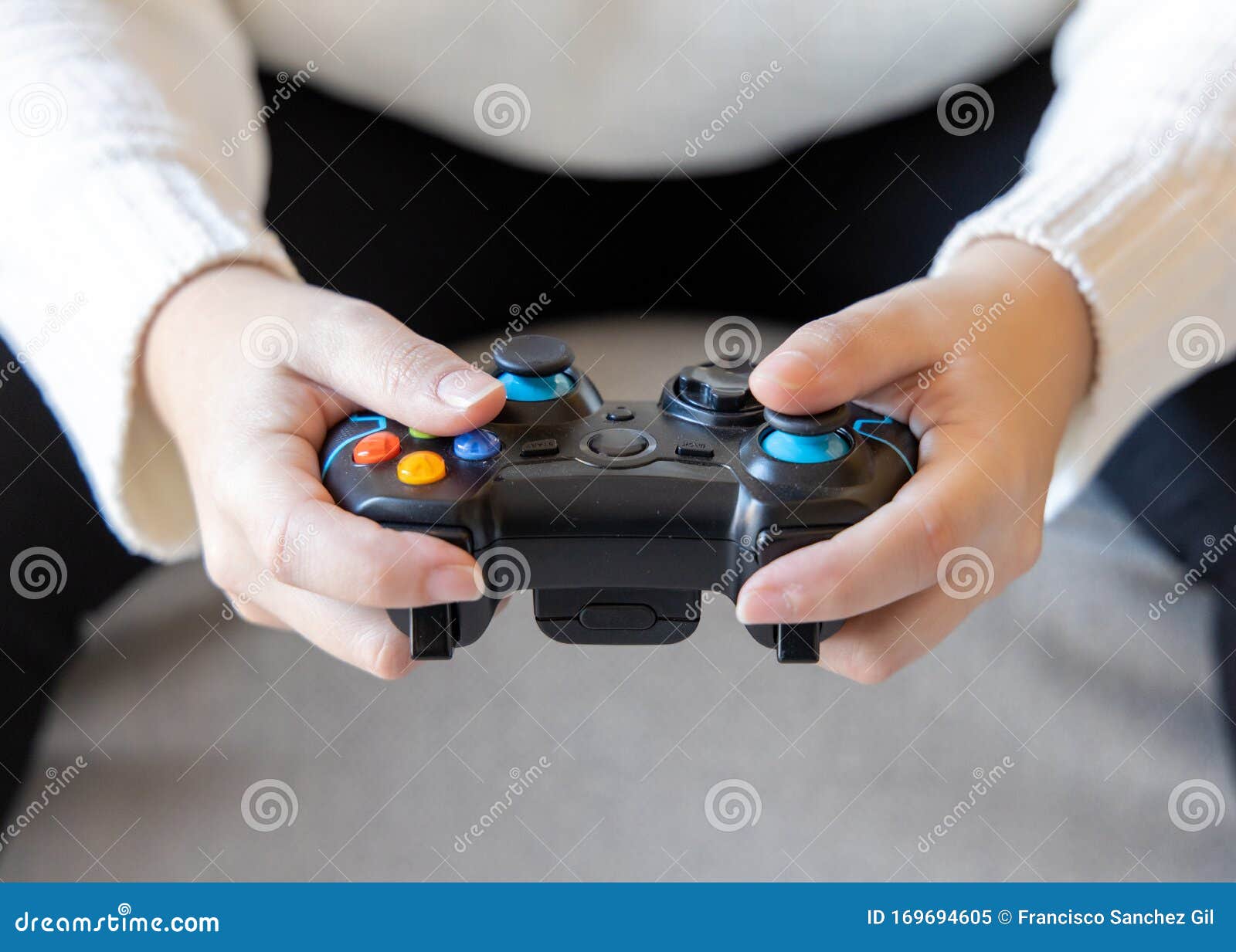 A Person Holding Game Controller Playing Video Games Stock Image ...