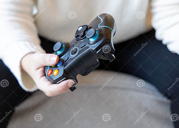 A Person Holding Game Controller Playing Video Games Stock Photo ...