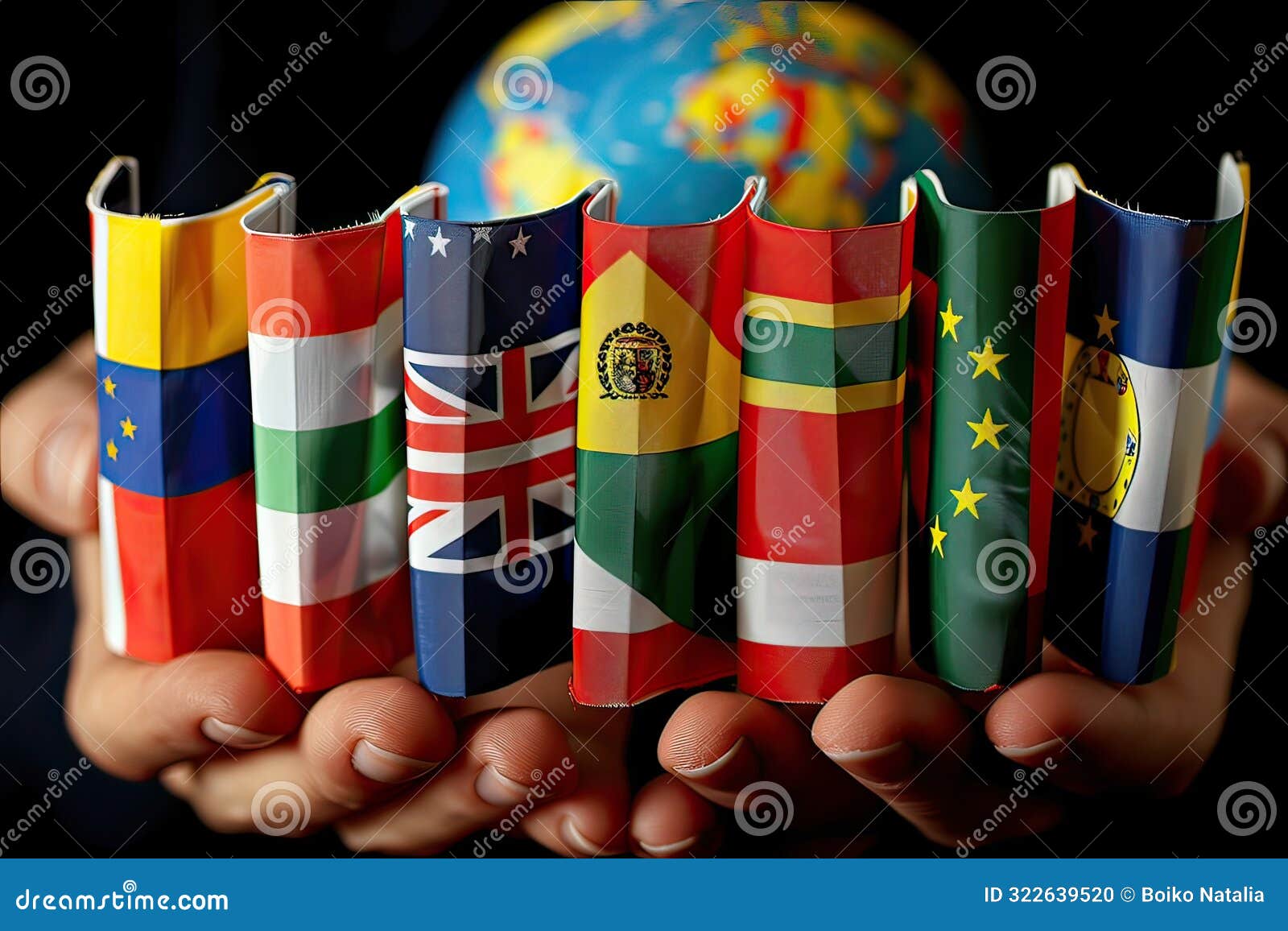 Person Holding Globe Surrounded by Flags of Different Countries Stock ...