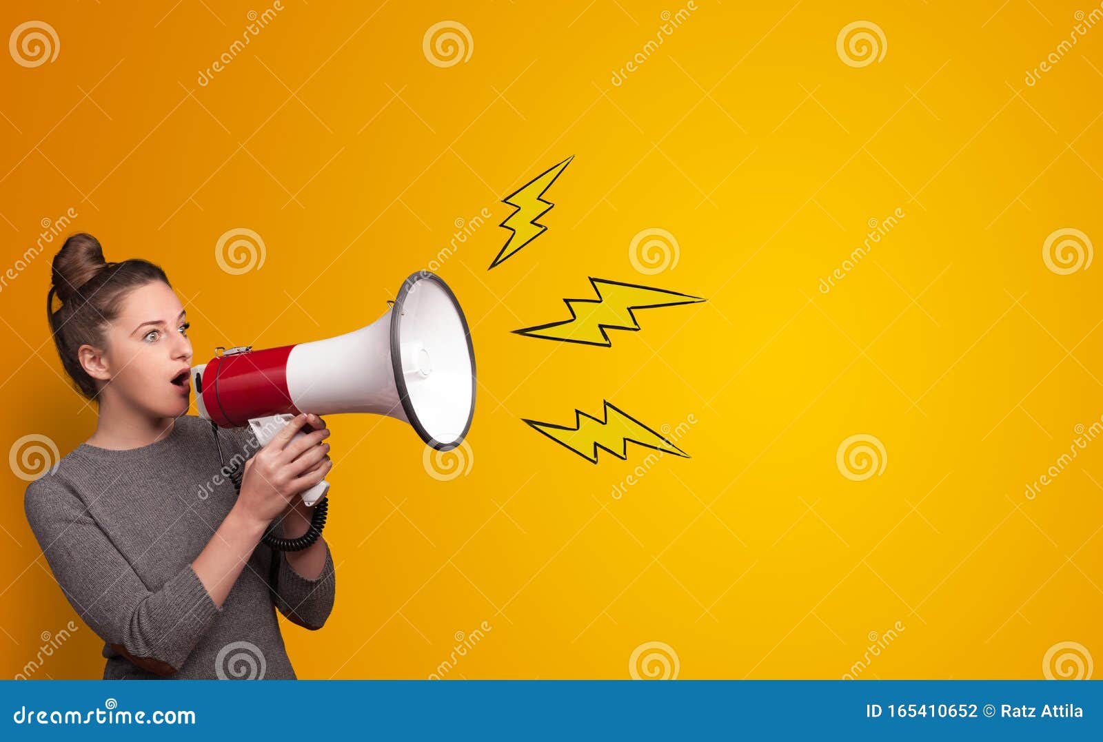 Person holding megaphone stock photo. Image of information - 165410652